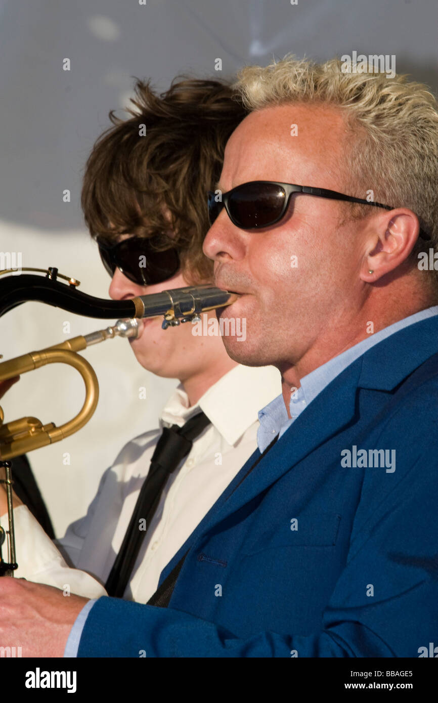 Two brass players at an open air show Stock Photo - Alamy