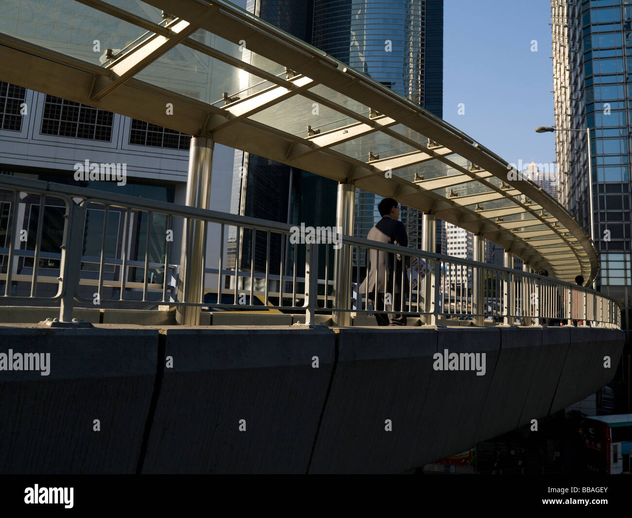 Man walking on overpass in Kowloon district; Asia Stock Photo - Alamy