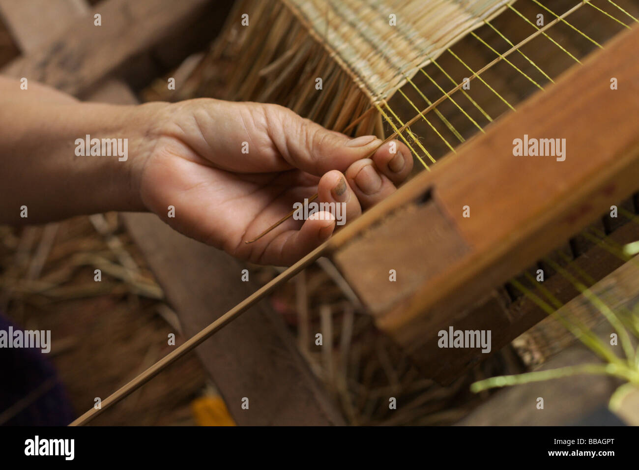 Woman weaving mat hi-res stock photography and images - Alamy