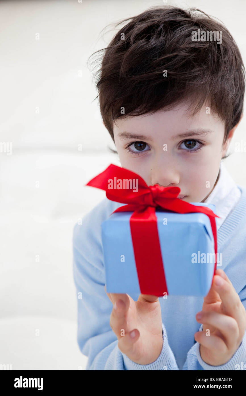 little boy with present Stock Photo - Alamy
