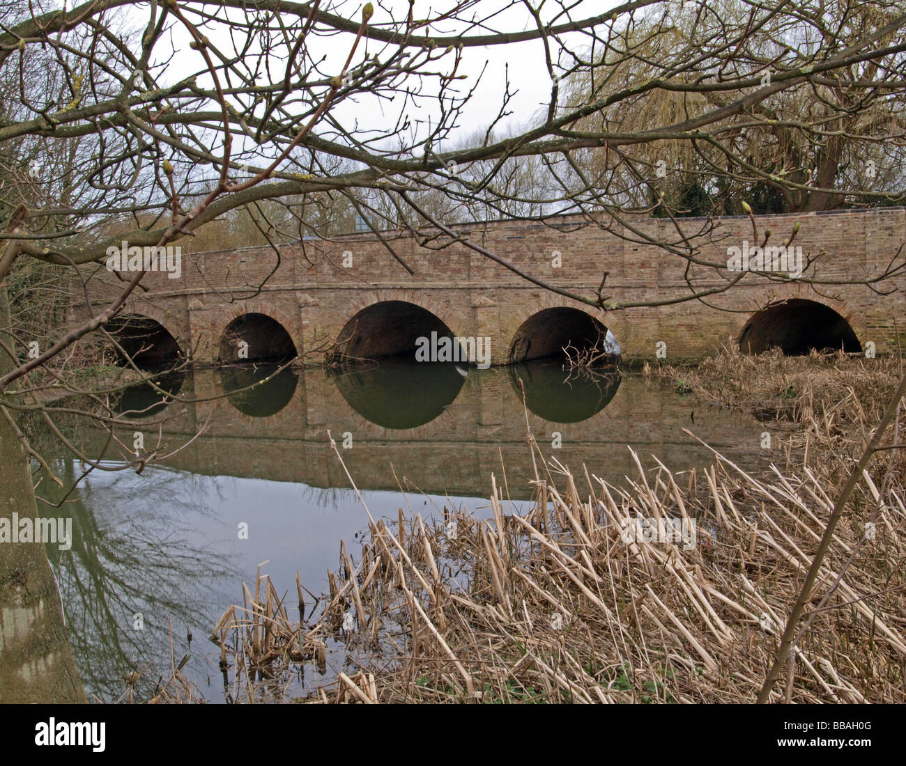 Brick bridge crossing Alconbury brook in Hinchingbrooke Country Park ...