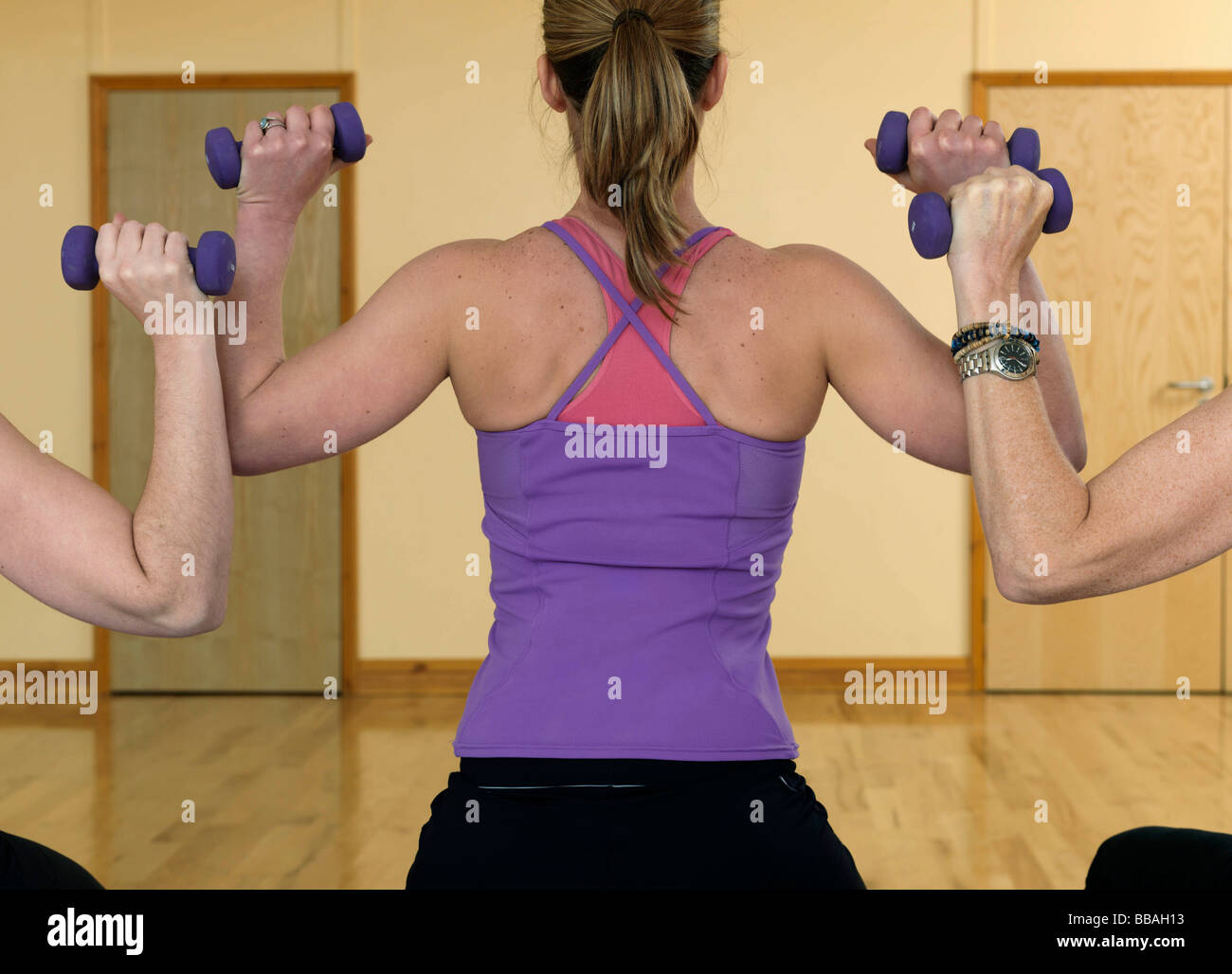 women exercising with weights at gym Stock Photo - Alamy
