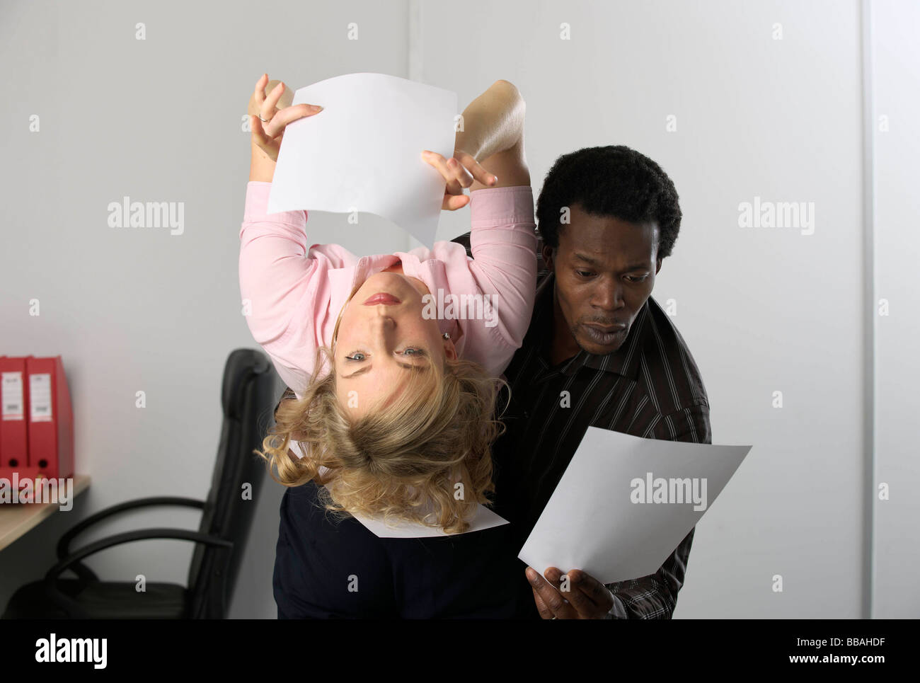 office workers reading papers Stock Photo - Alamy