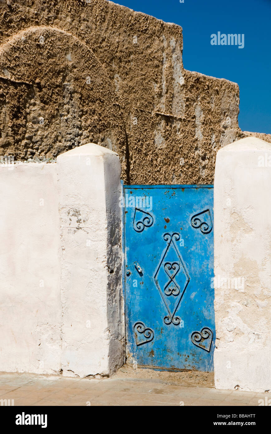 Decorated blue iron gate, the famous white city of Essaouria, Morocco ...
