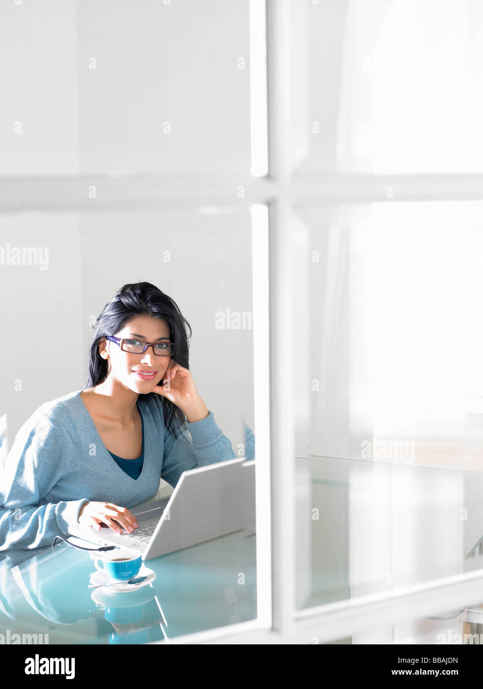 Woman working on computer Stock Photo - Alamy