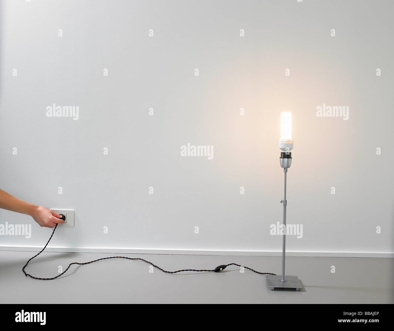 Lamp with energy saver light bulb Stock Photo - Alamy