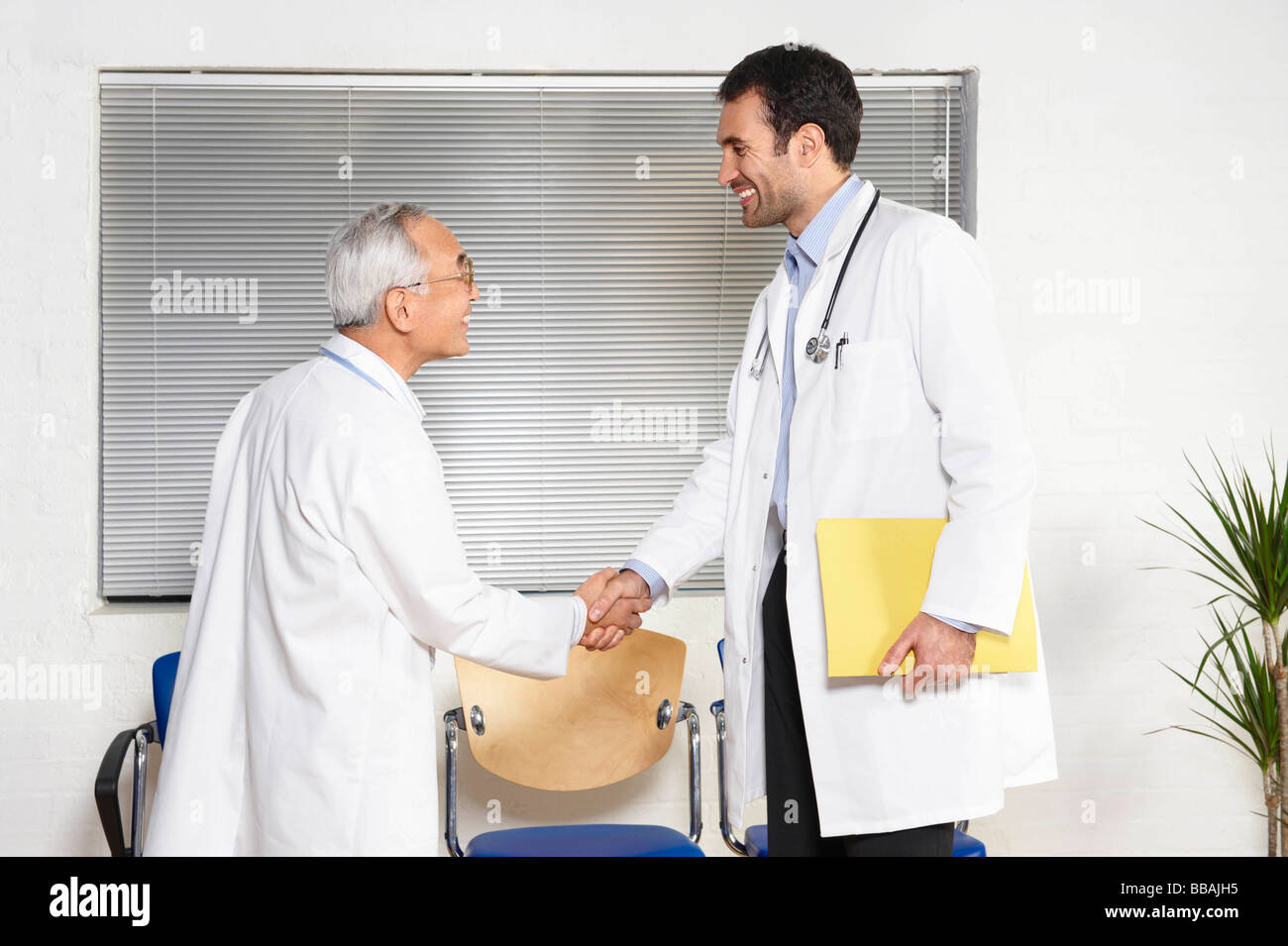 Doctors in waiting room Stock Photo - Alamy