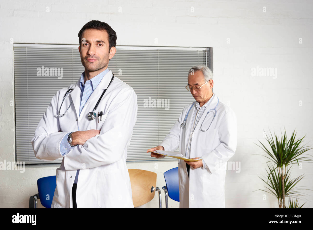 Doctors in waiting room Stock Photo - Alamy