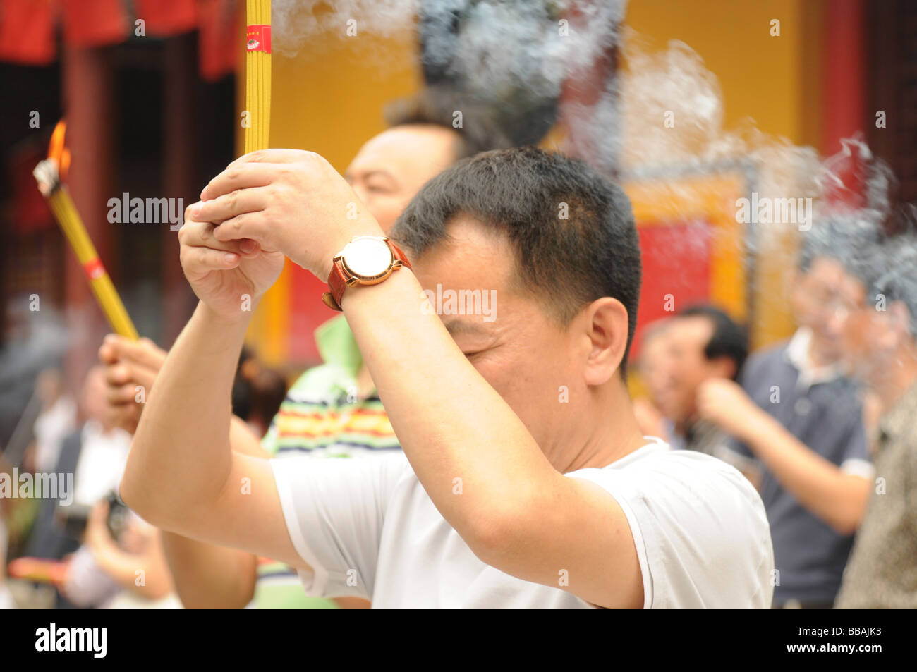 China Shanghai worshippers burning essence at the Jade Buddha Buddhist ...