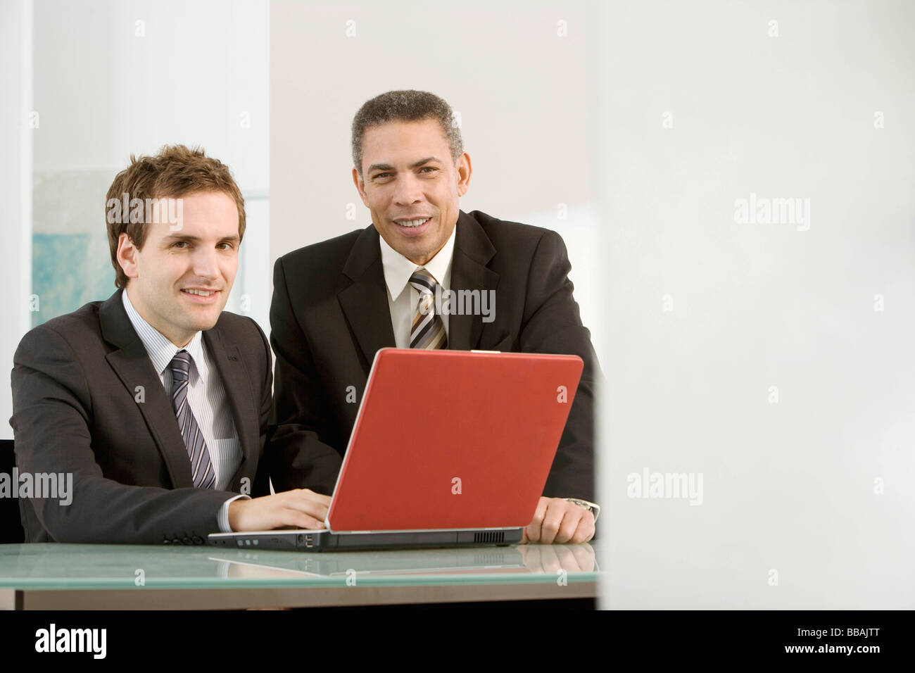 Multi ethnic business colleagues posing hi-res stock photography and ...