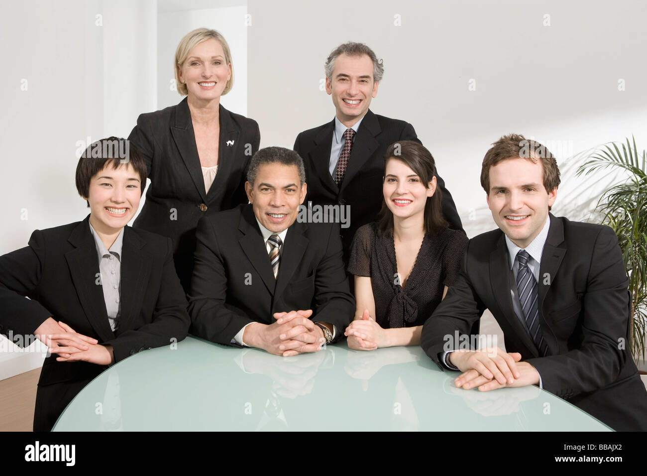 Portrait of a business meeting Stock Photo - Alamy