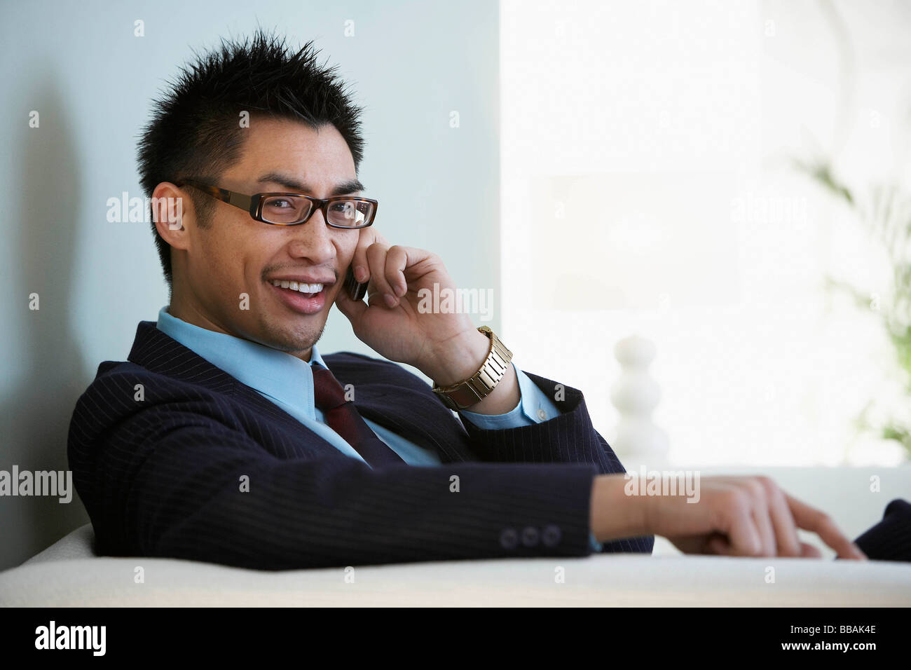 A businessman on his mobile phone Stock Photo - Alamy