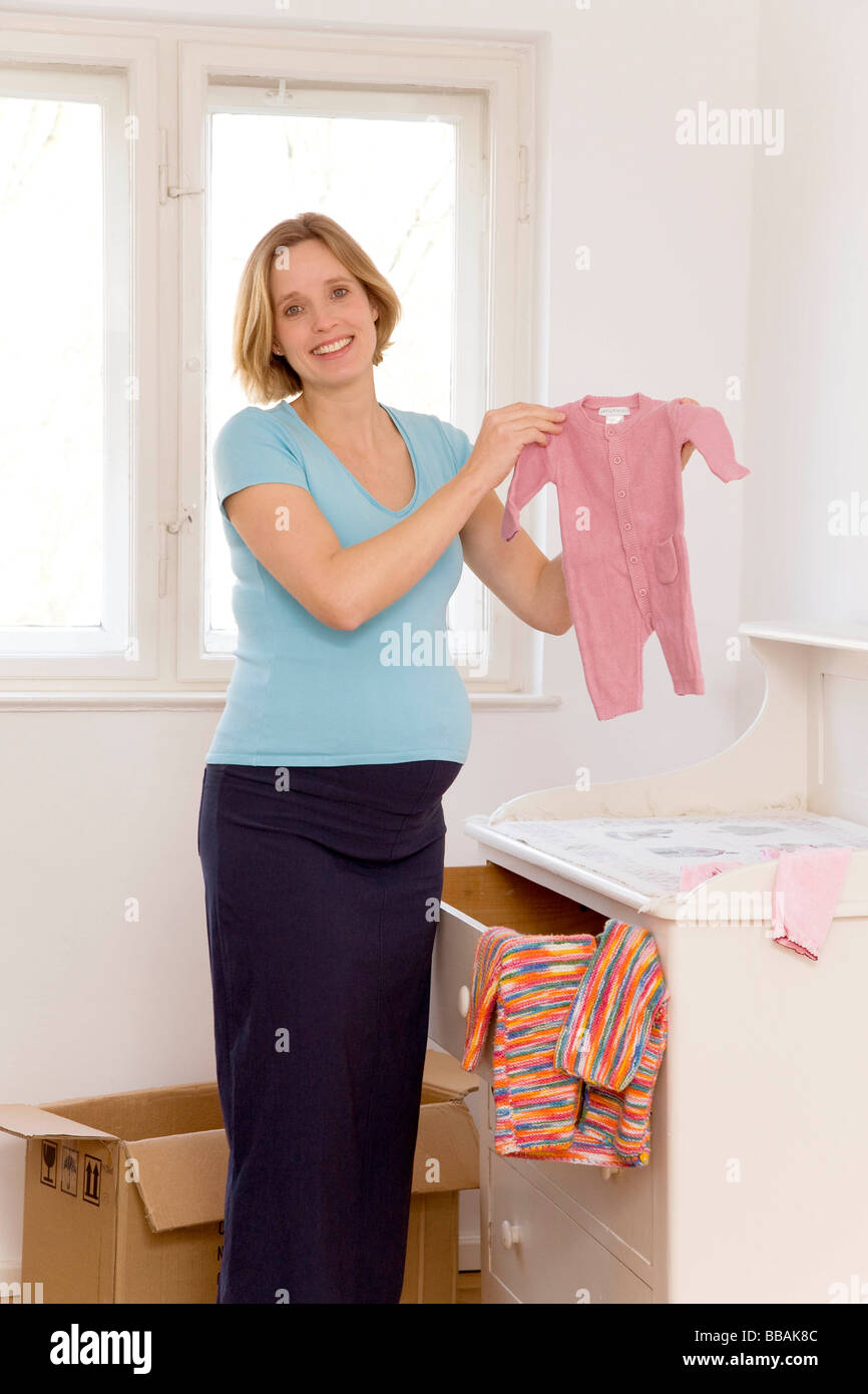 Baby box clothes hi-res stock photography and images - Alamy