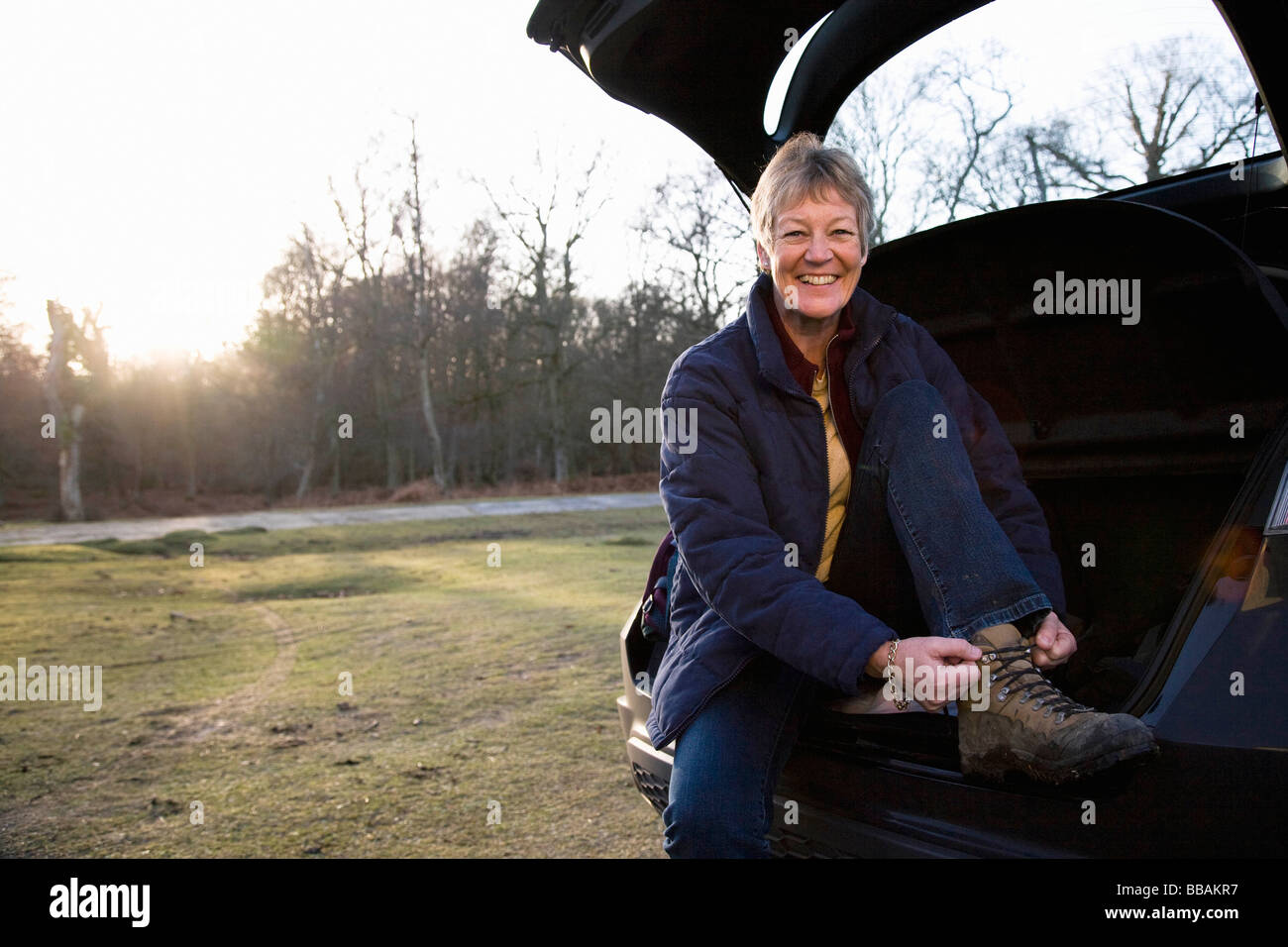 Retired Woman Preparing for Walk Stock Photo - Alamy
