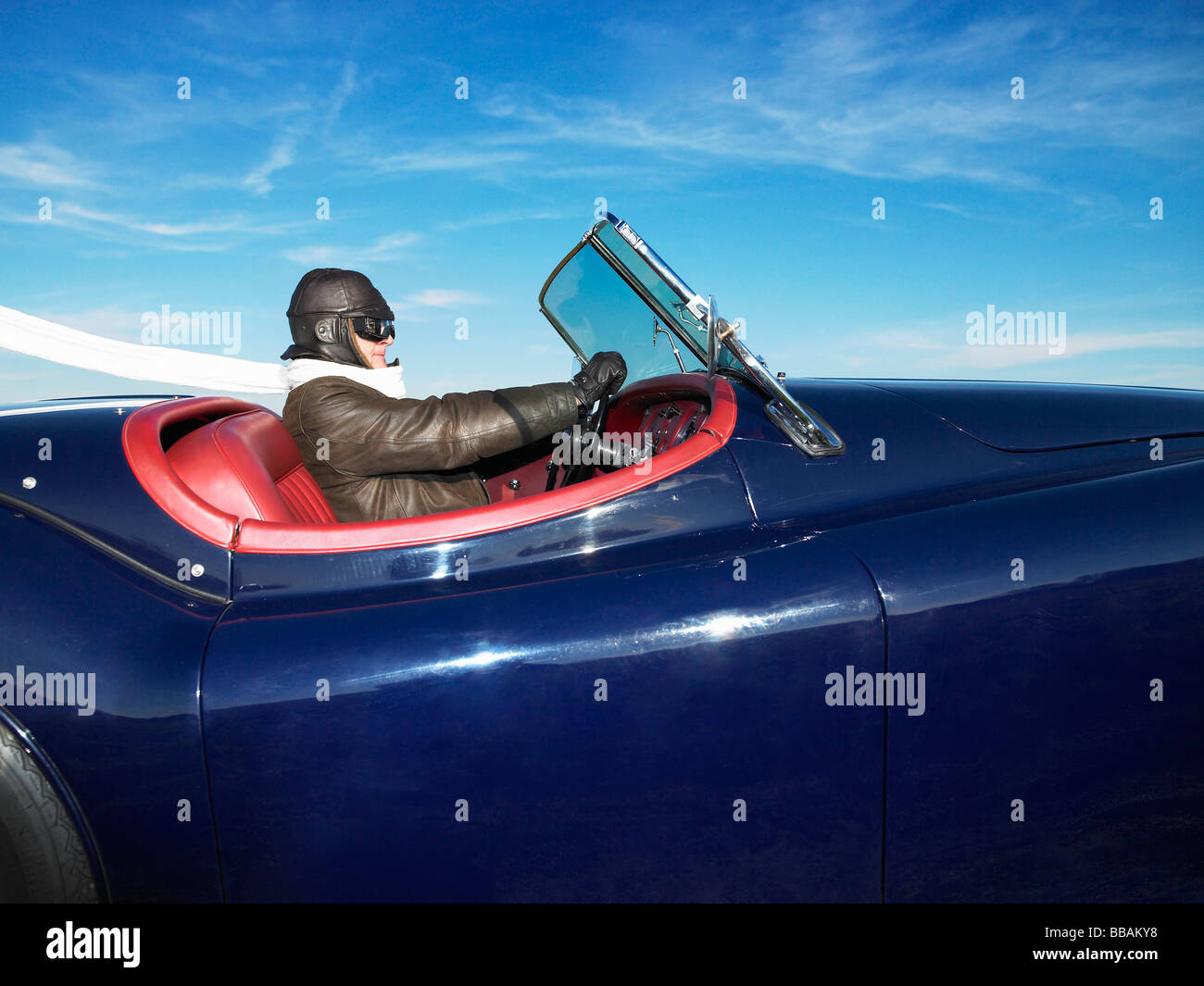Man in an old convertible Stock Photo - Alamy