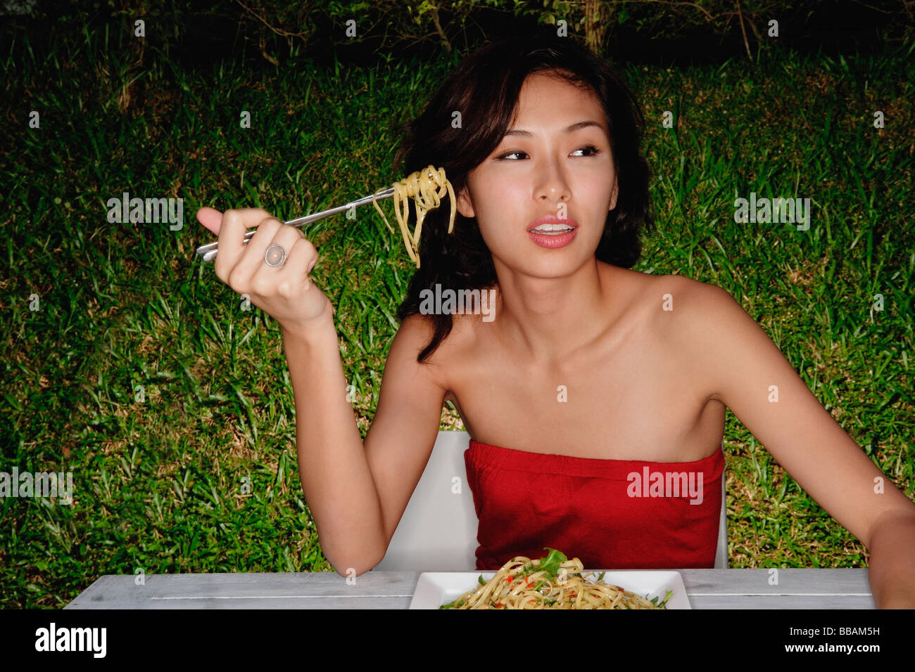 Woman restaurant eating full plate hi-res stock photography and images ...