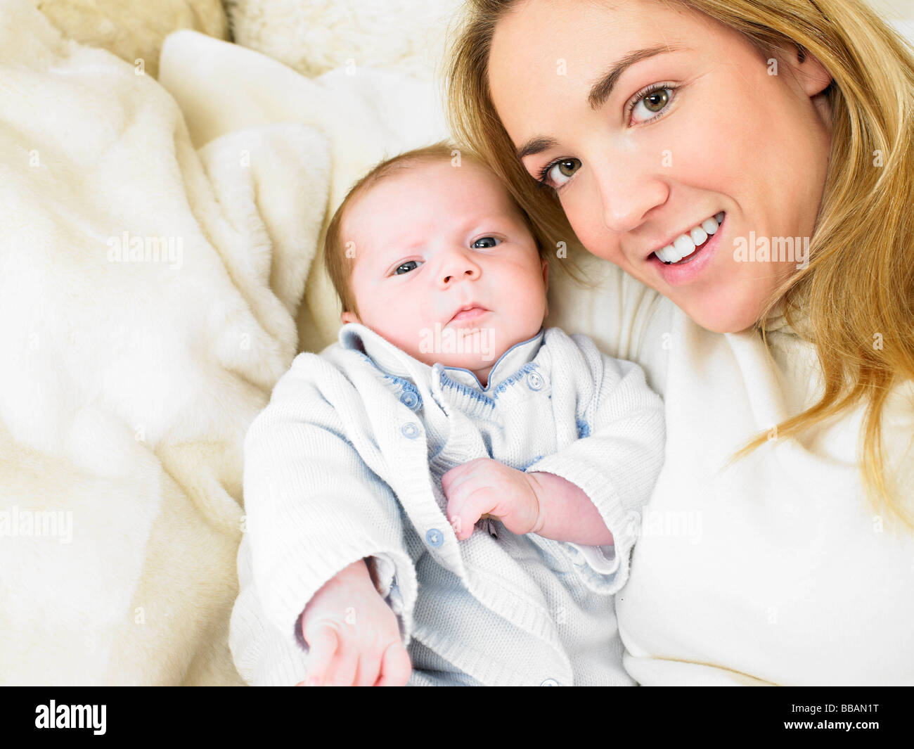 Mother smiling with her baby Stock Photo - Alamy