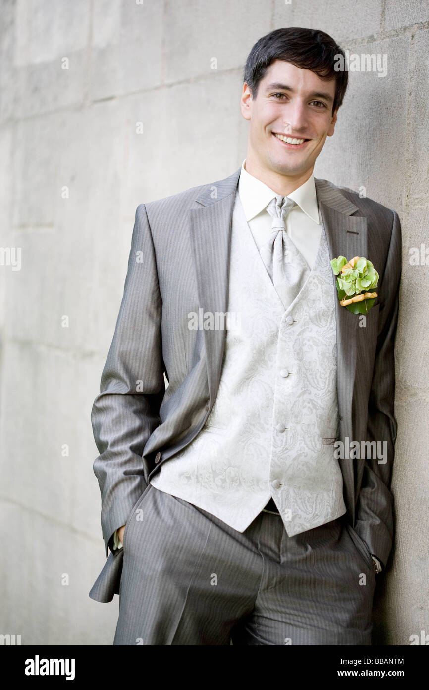 Groom smiling at the camera Stock Photo - Alamy