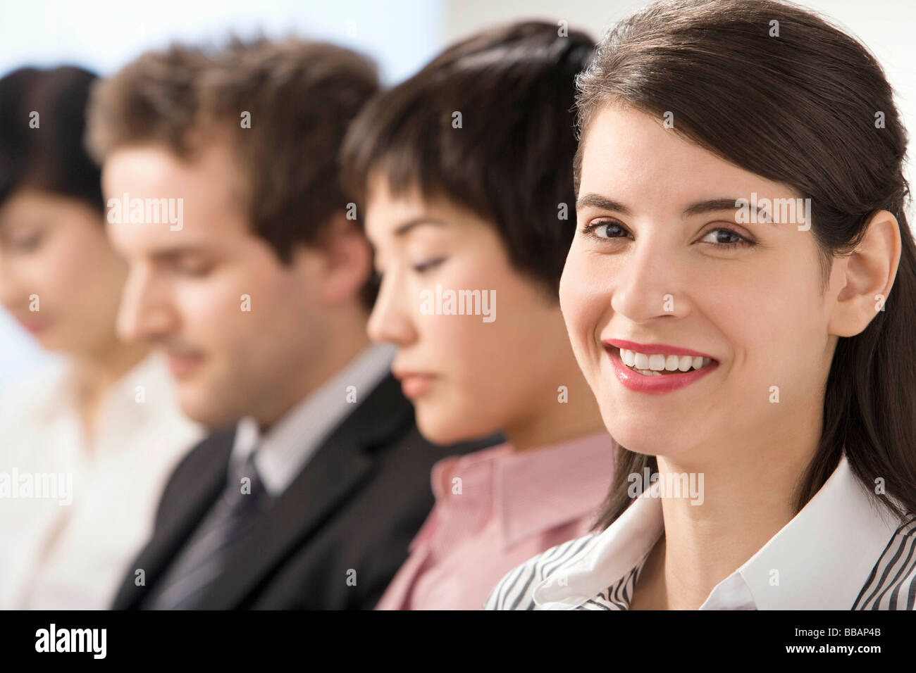 A line of young professionals Stock Photo - Alamy
