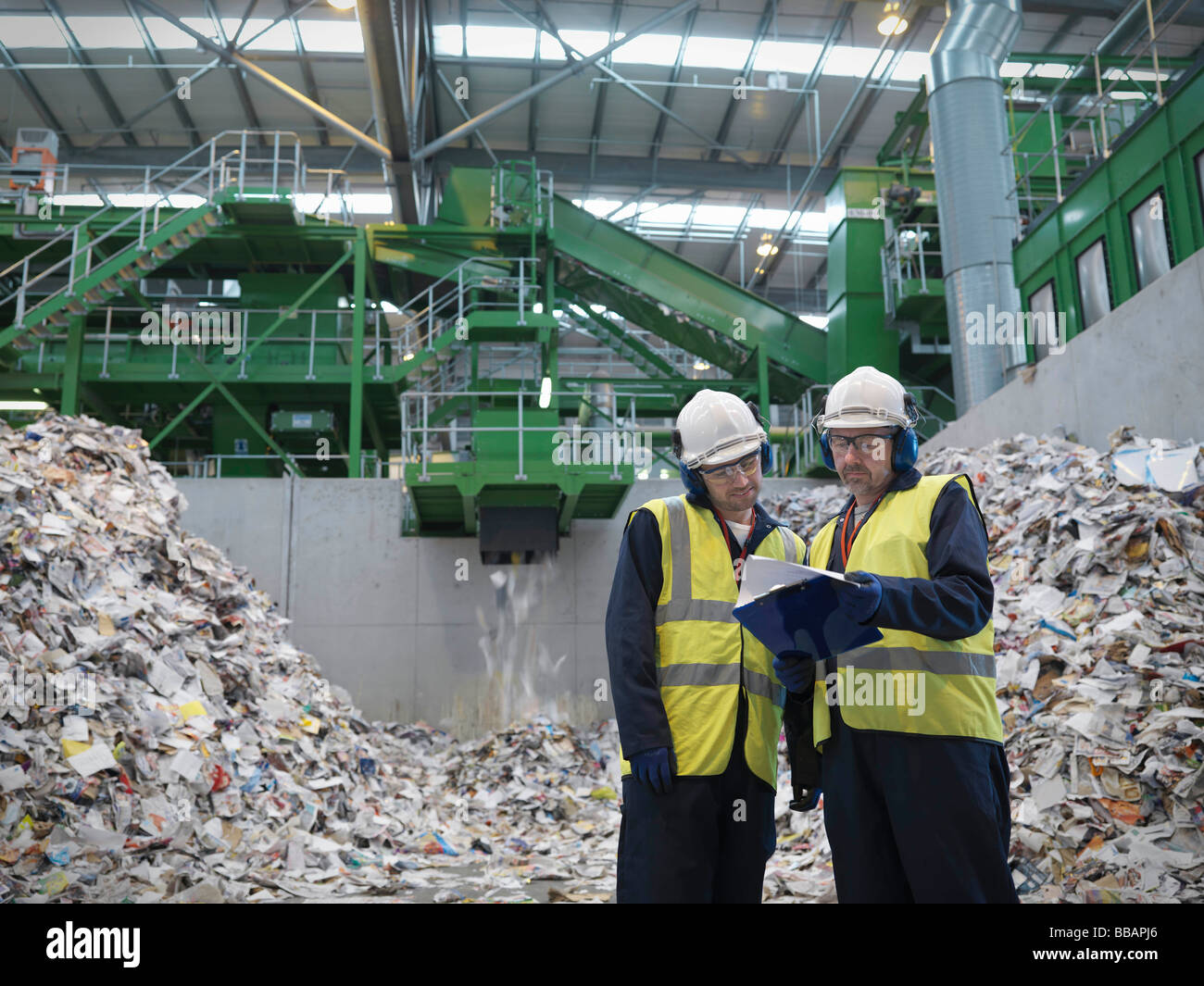 Paper recycling plant worker hi-res stock photography and images - Alamy
