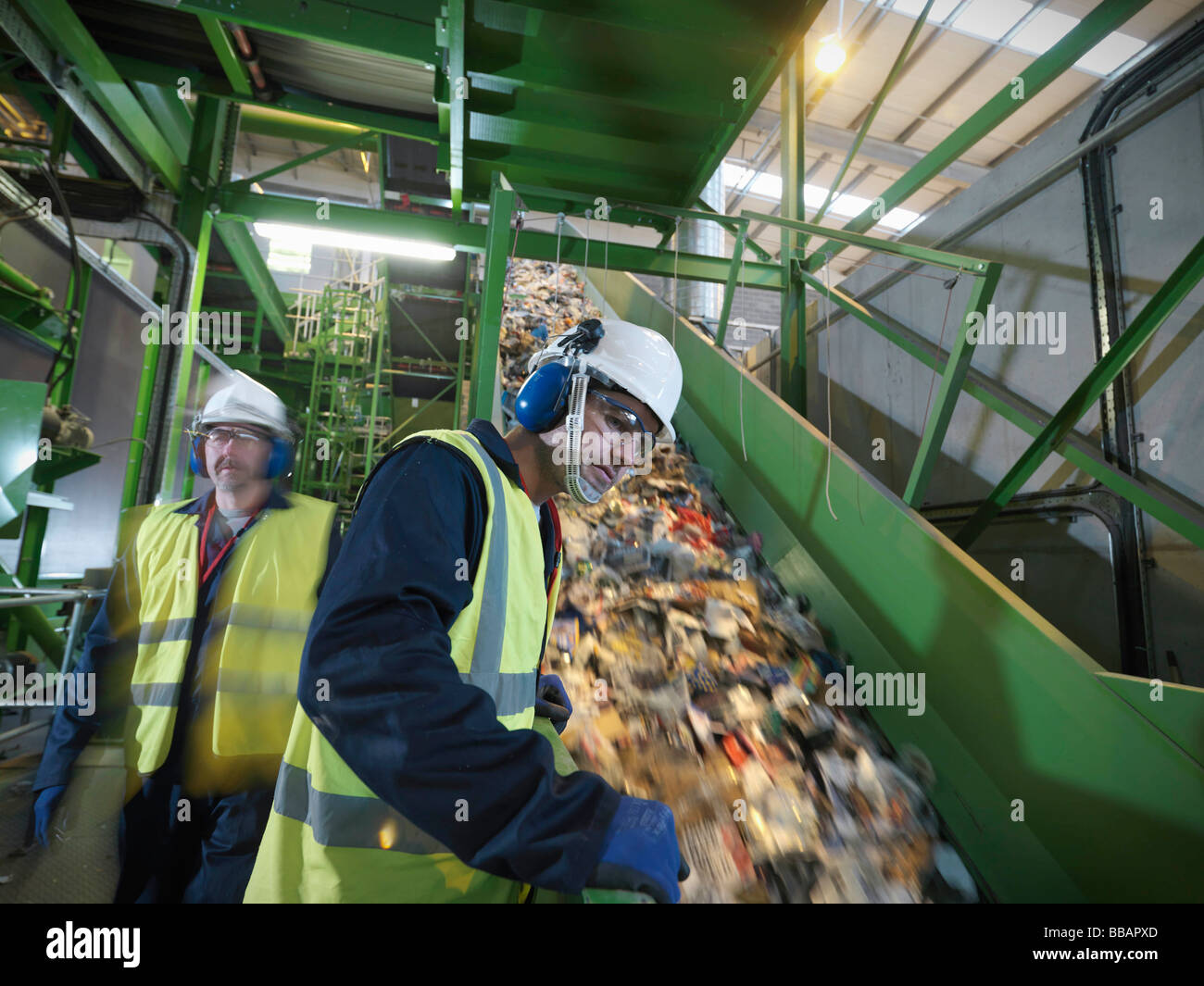 Recycling worker conveyor hi-res stock photography and images - Alamy