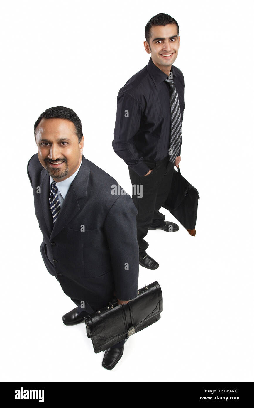 Two businessmen with briefcases hi-res stock photography and images - Alamy