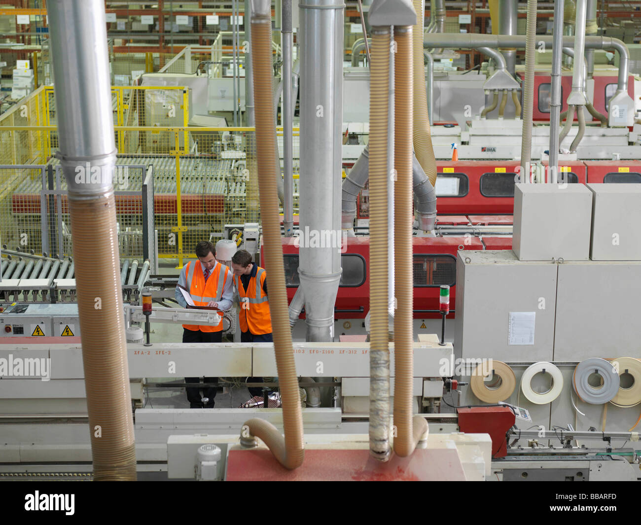 Two machines working together hi-res stock photography and images - Alamy