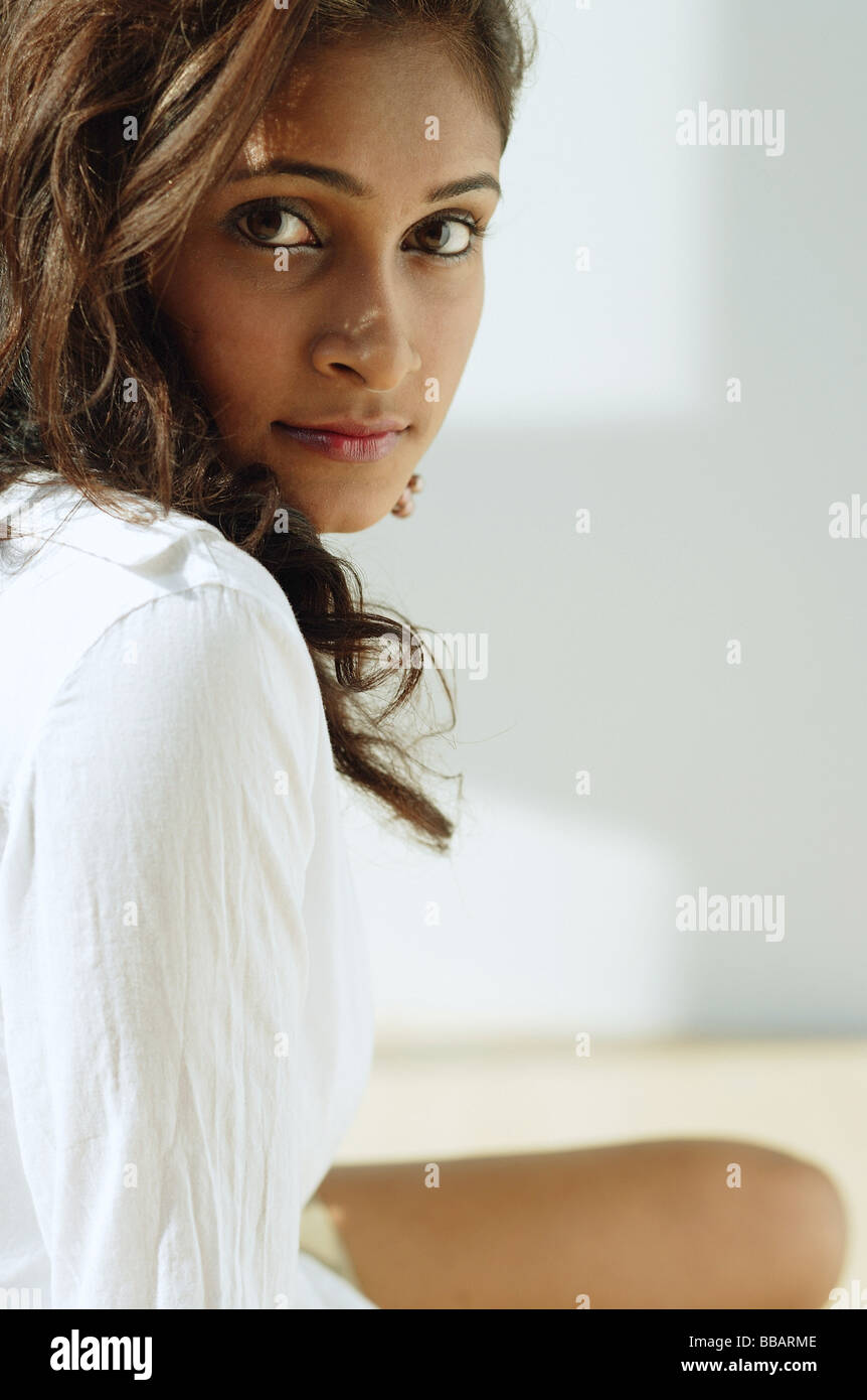 Woman looking at camera, portrait Stock Photo - Alamy