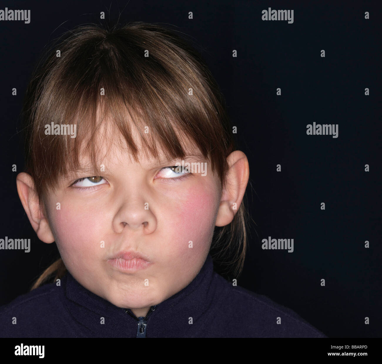 Girl making a grimace, close-up Stock Photo - Alamy
