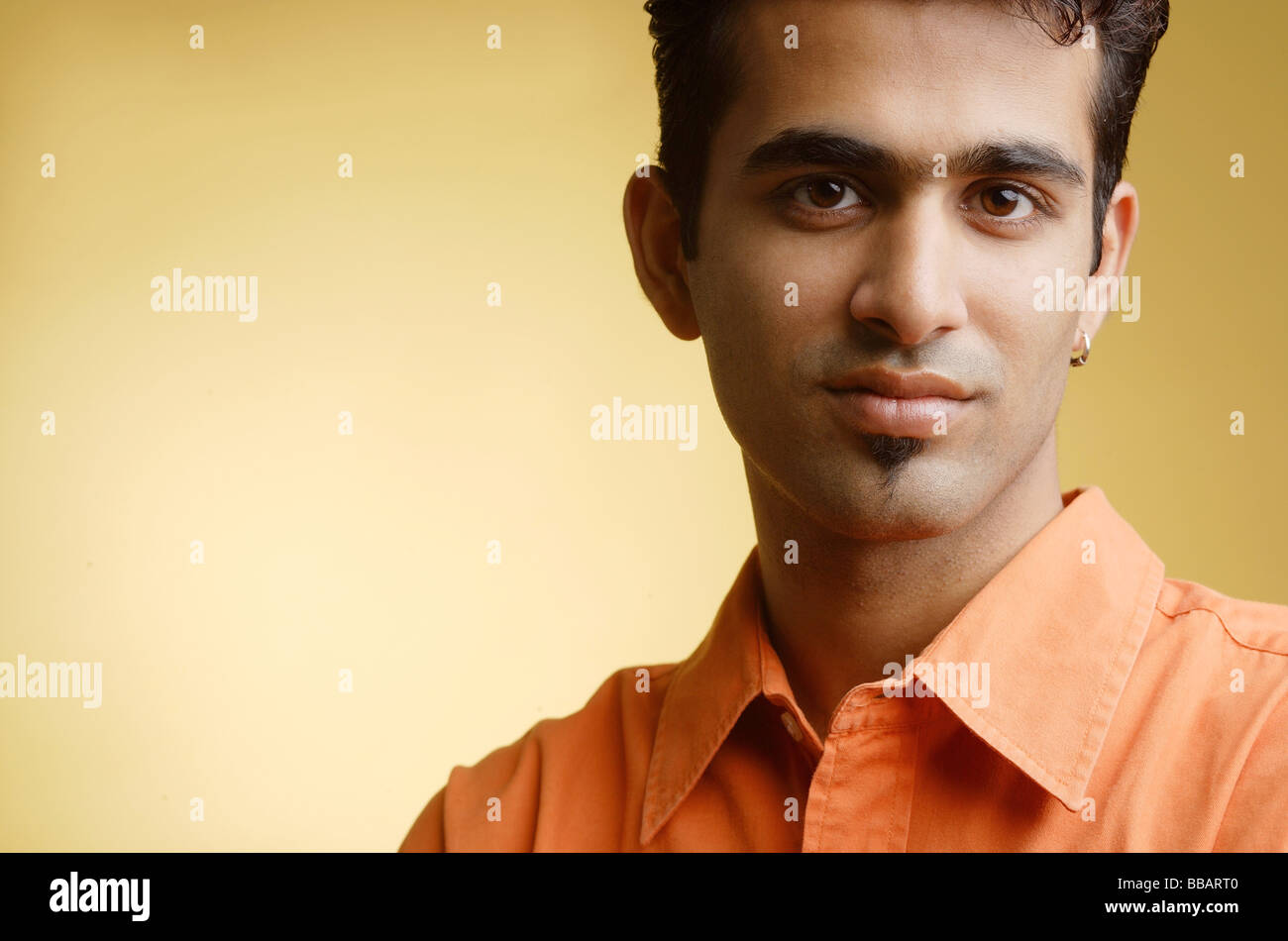 Man looking at camera Stock Photo - Alamy