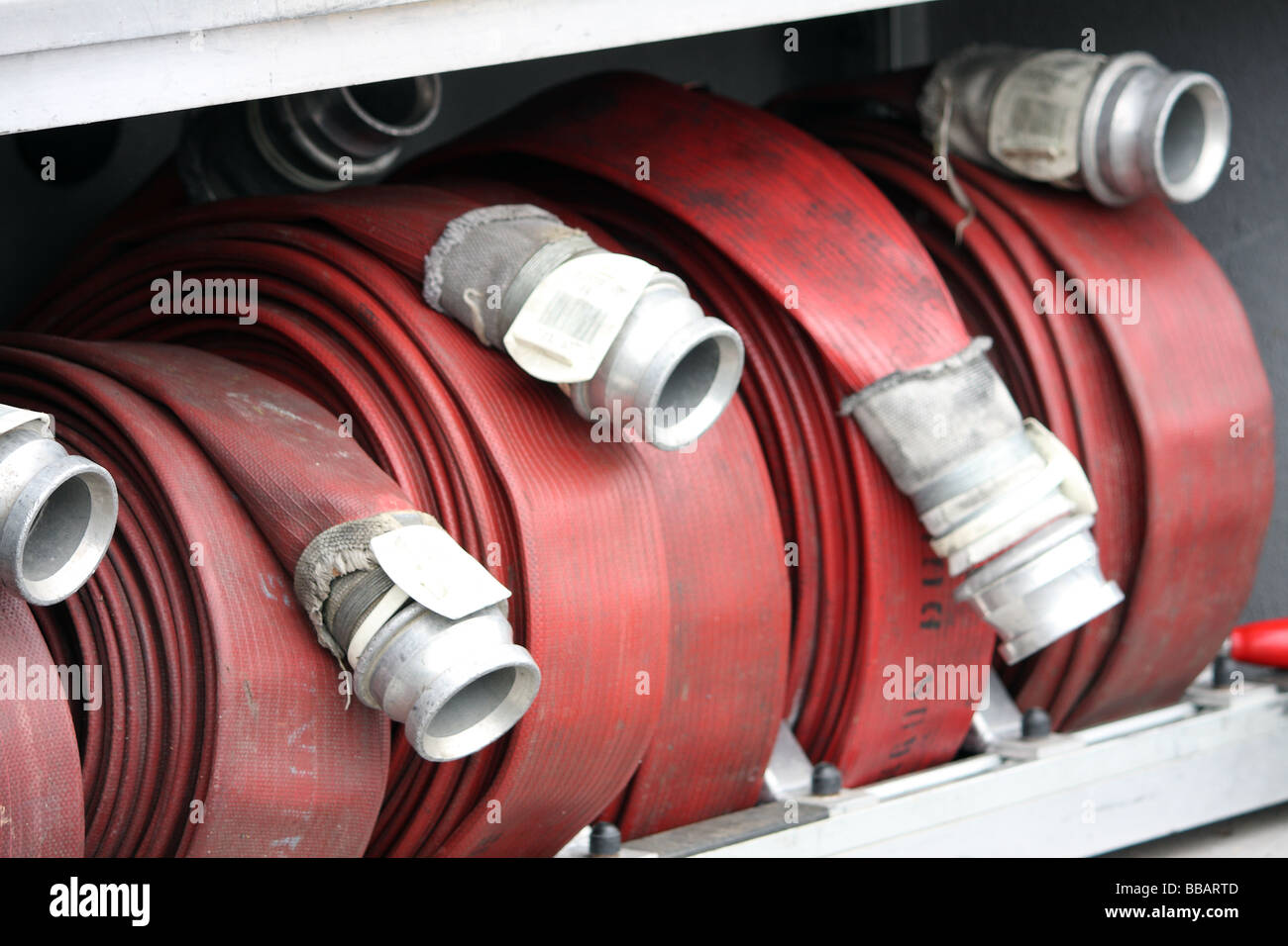 A photograph of a firemans hose for putting out fires Stock Photo - Alamy