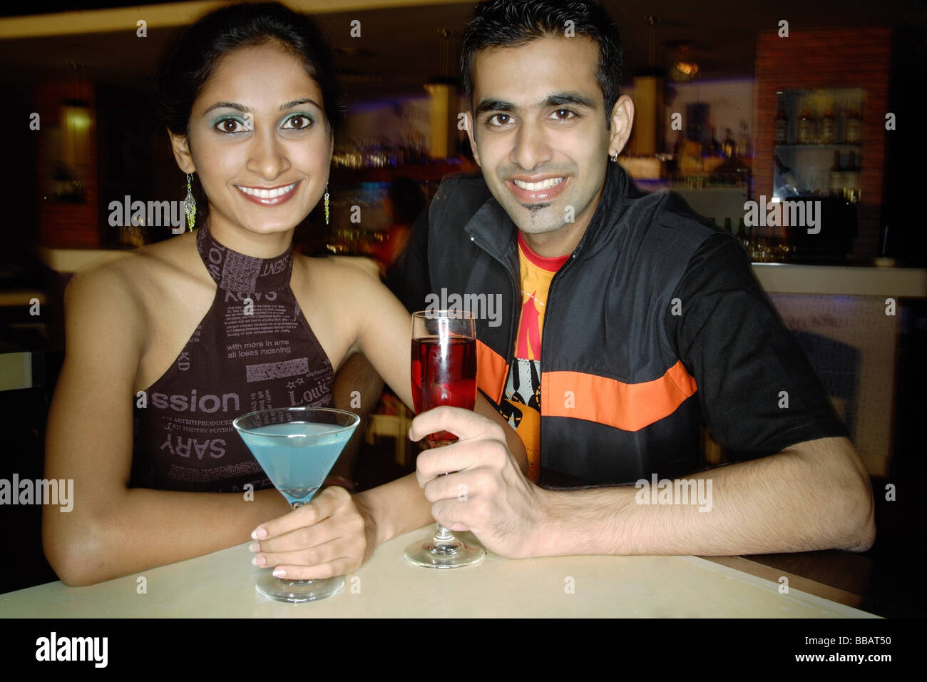 Couple side by side at night club hi-res stock photography and images ...
