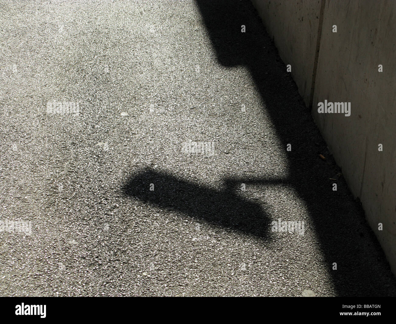 one cctv camera shadow in dark back alley in street in city town Stock ...