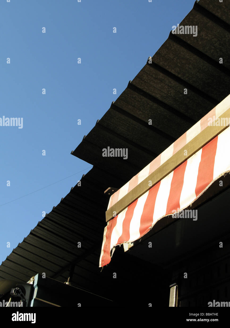 detail of closed market stall stand in sun Stock Photo - Alamy