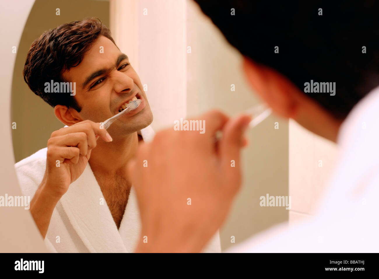 Man brushing his teeth Stock Photo - Alamy