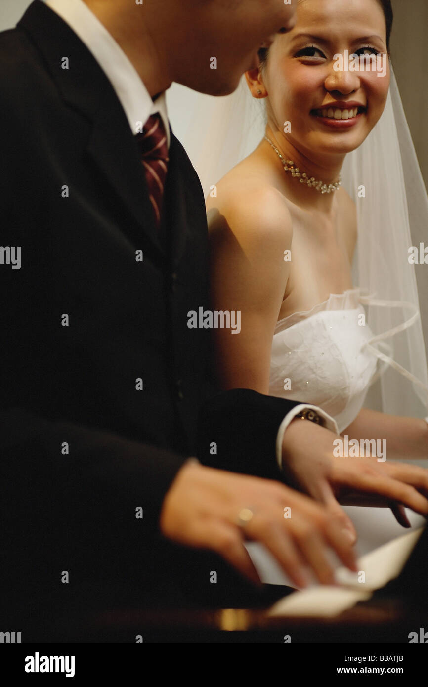 Playing piano suit hi-res stock photography and images - Alamy