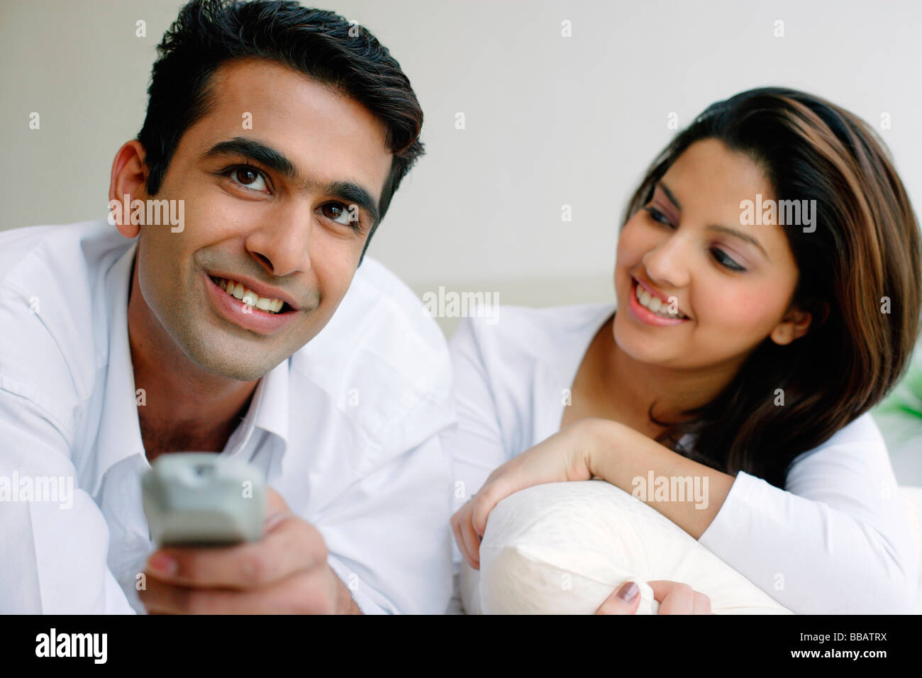Indian couples remote control hi-res stock photography and images - Alamy