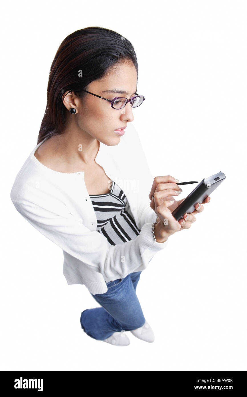 Woman using PDA, high angle view Stock Photo - Alamy