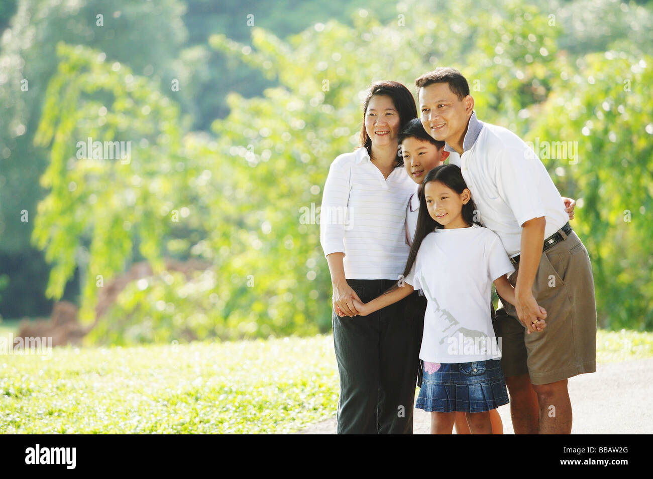 Family standing together, portrait Stock Photo - Alamy