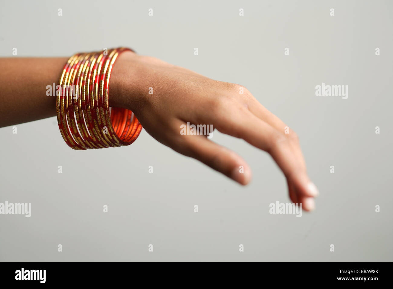 Womans hand with bangles hi-res stock photography and images - Alamy