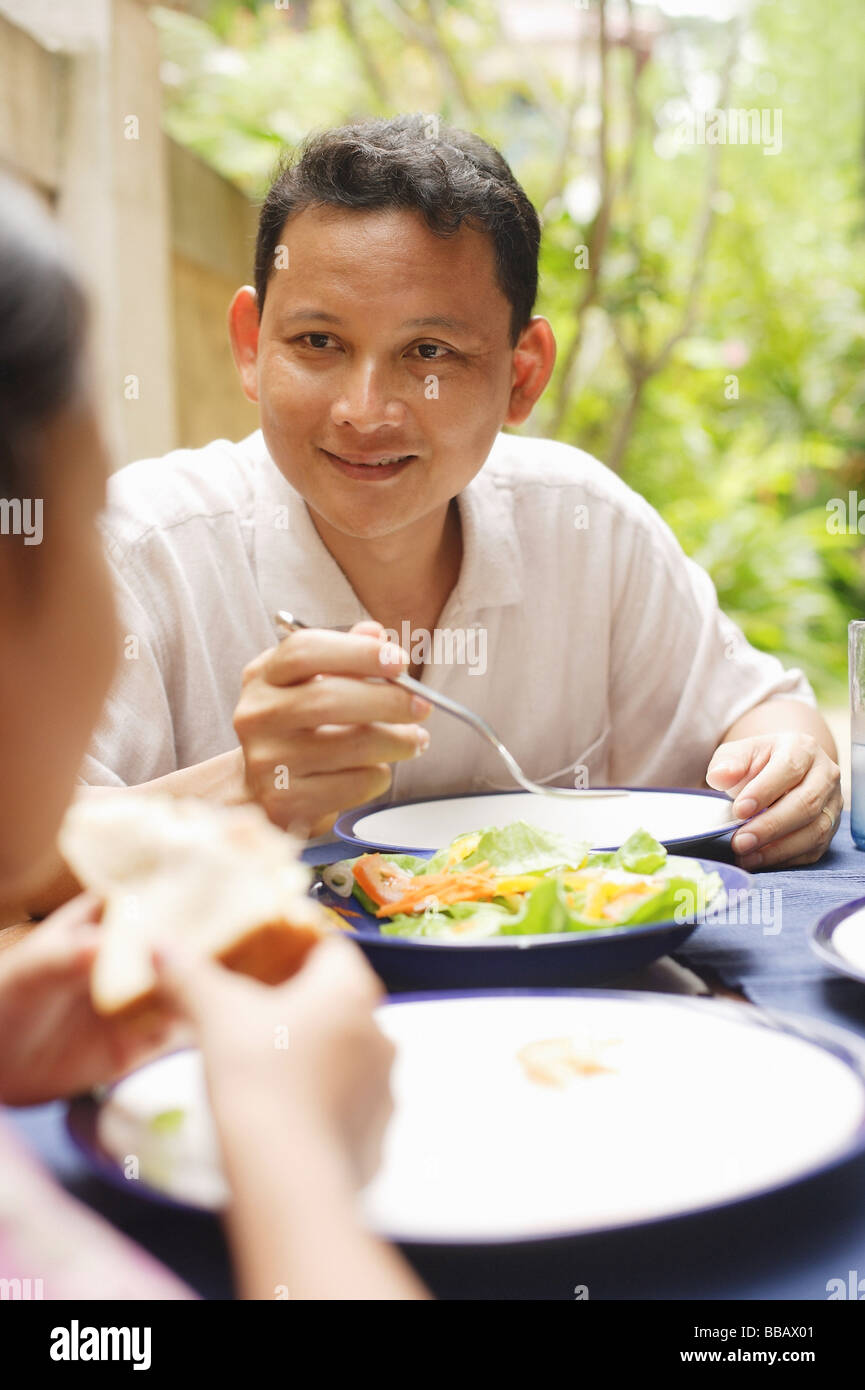 Man eating, portrait Stock Photo - Alamy