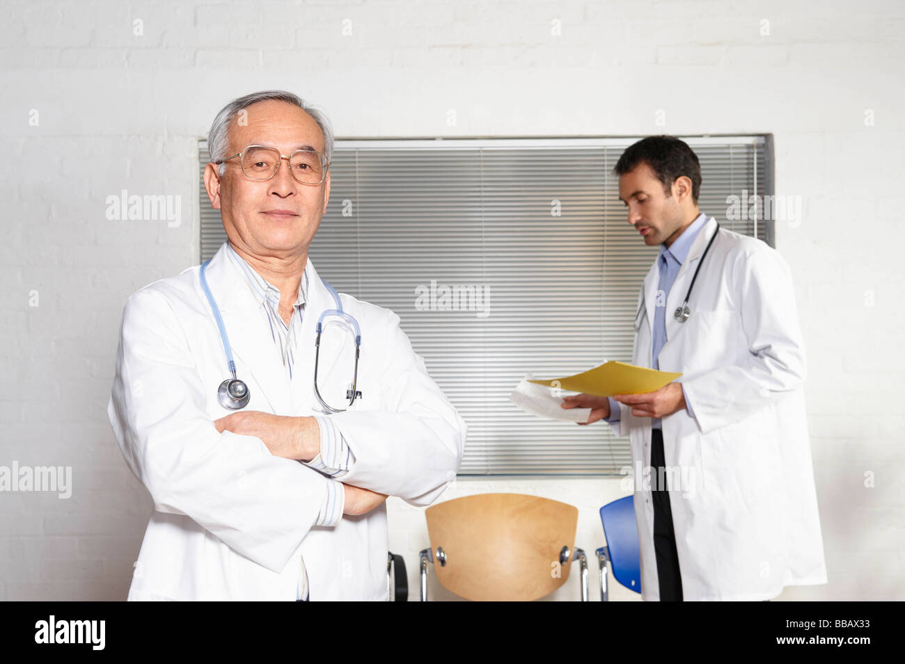 Doctors in waiting room Stock Photo - Alamy