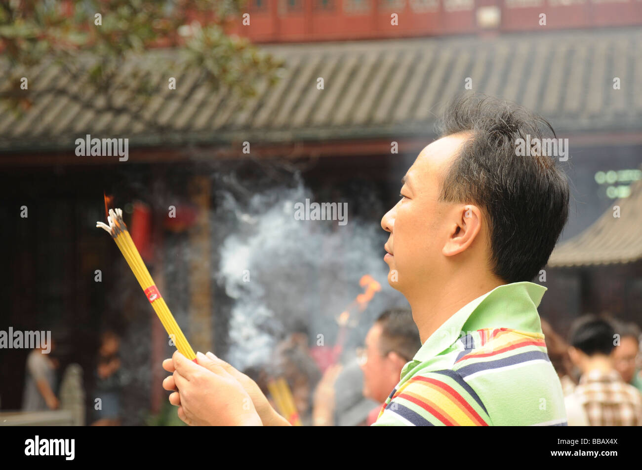 China Shanghai worshippers burning essence at the Jade Buddha Buddhist ...