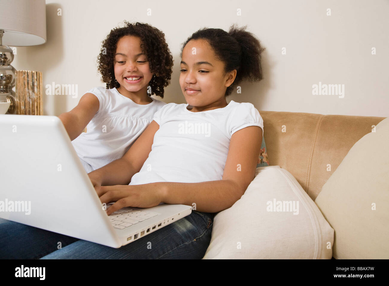 Sisters at work Stock Photo - Alamy