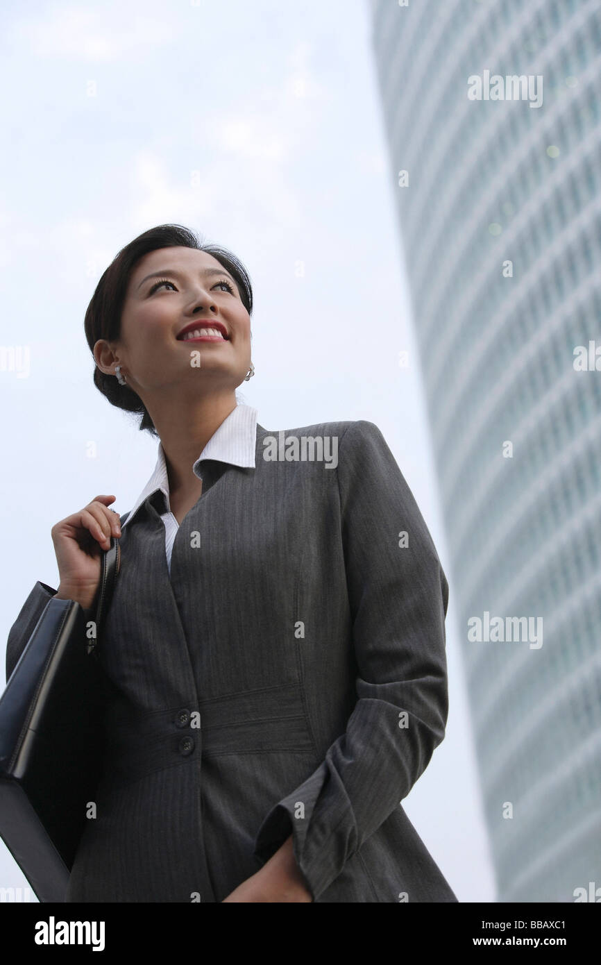 She stands hi-res stock photography and images - Alamy
