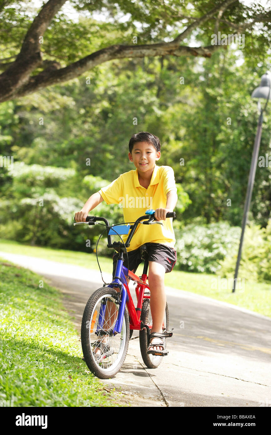 Black boy on bicycle hi-res stock photography and images - Alamy