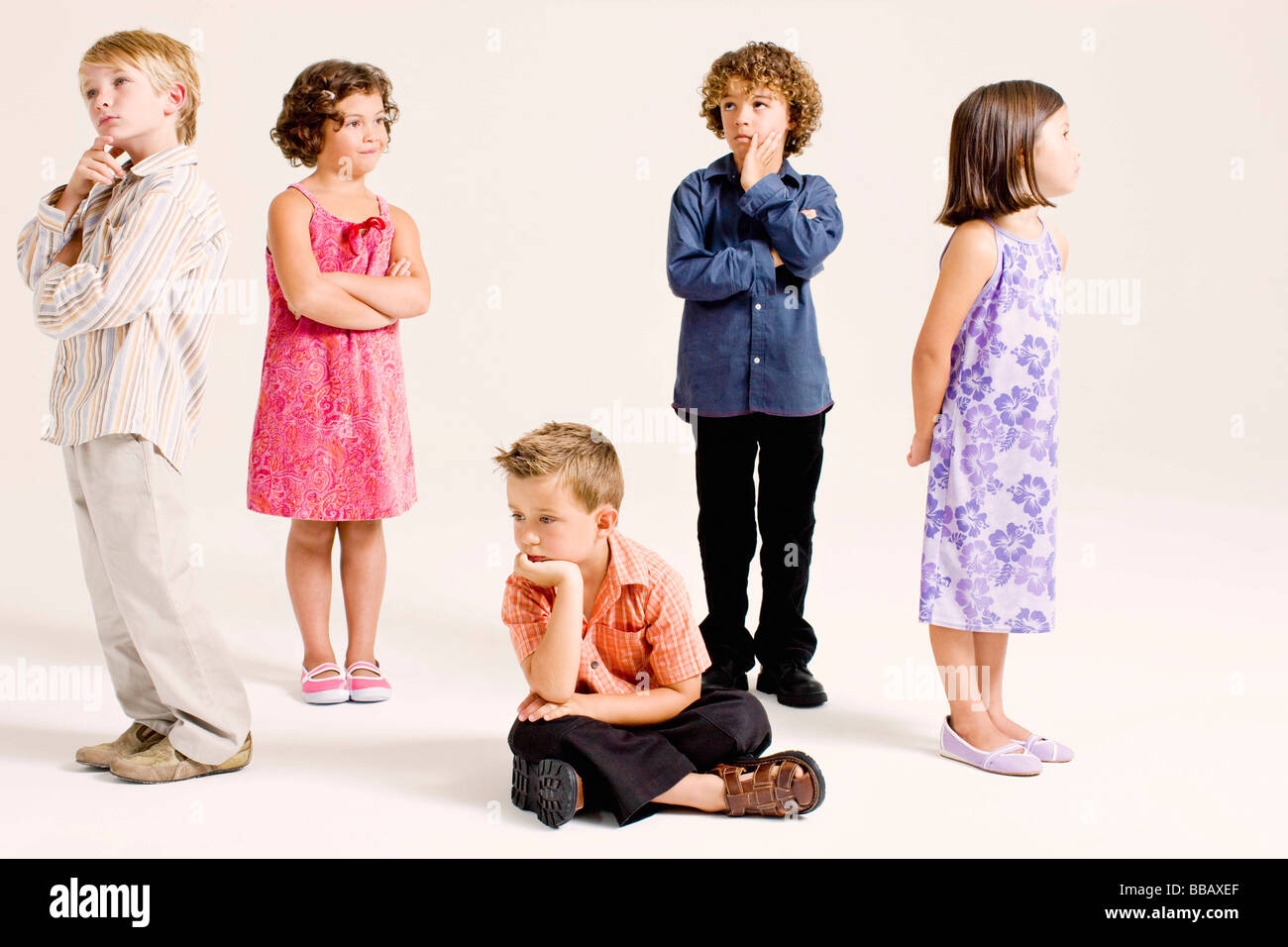 kids in thinking poses Stock Photo - Alamy