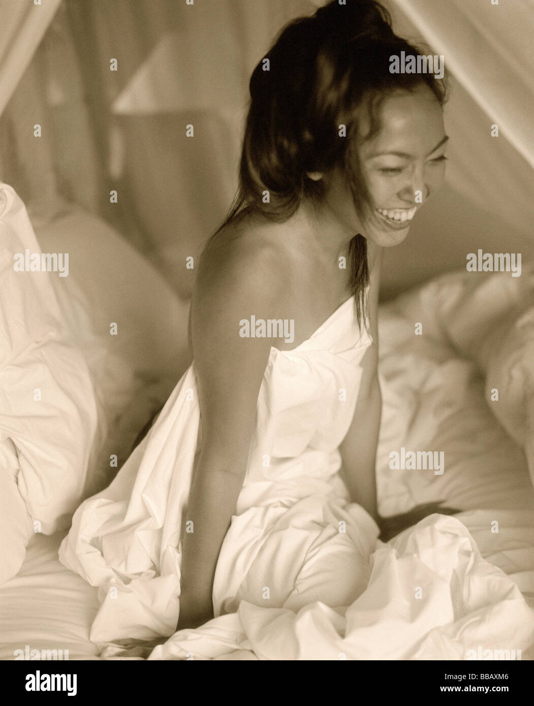 Young woman wrapped in sheet hi-res stock photography and images - Alamy