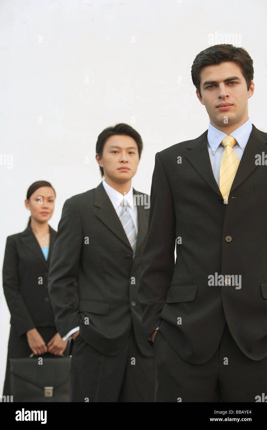 Business people standing in a row Stock Photo - Alamy