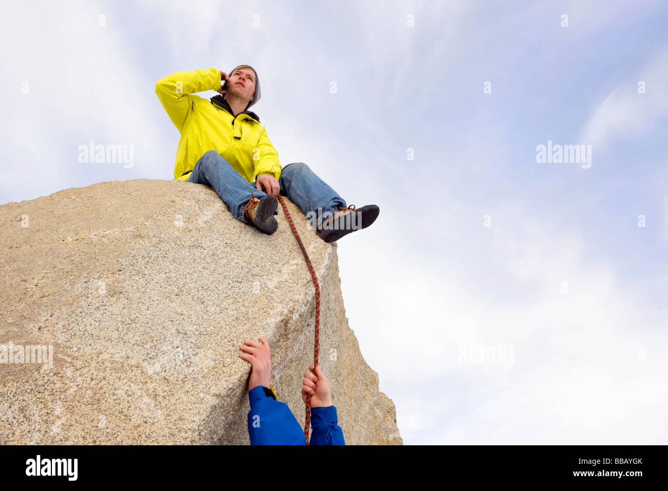Climber belaying fellow climber Stock Photo - Alamy